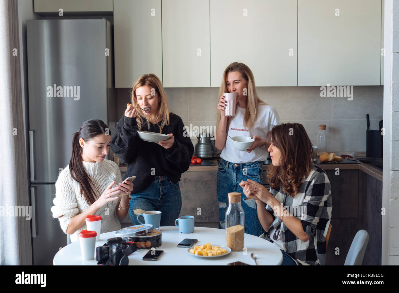 group of women in the kitchen Stock Photo - Alamy