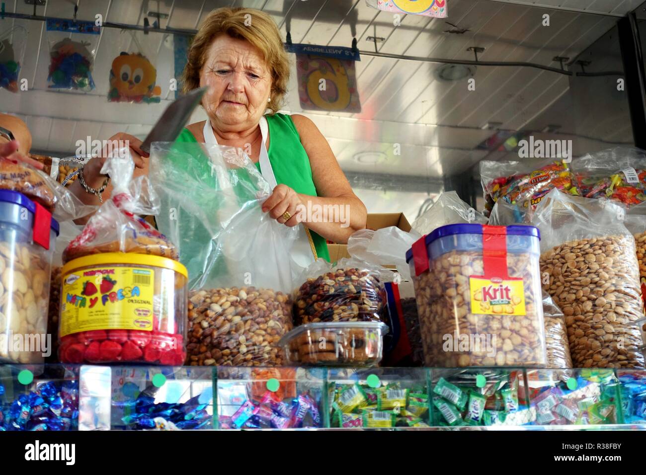 San Javier, Spain - August 02 2018: Female sweet and snack vendor ...