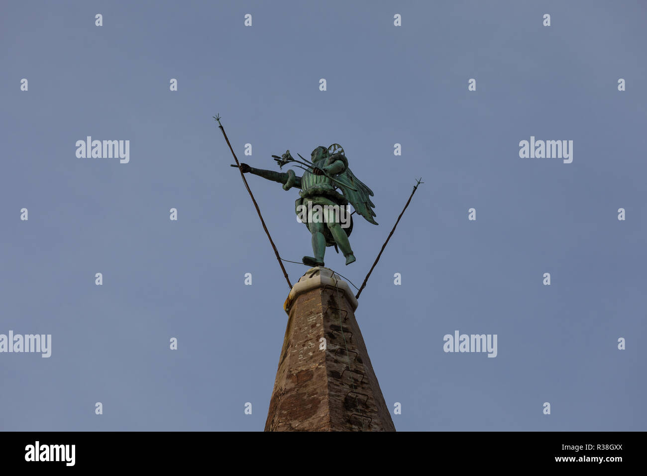 Weathervane statue of Archangel Michael on the top of Basilica of Saint ...