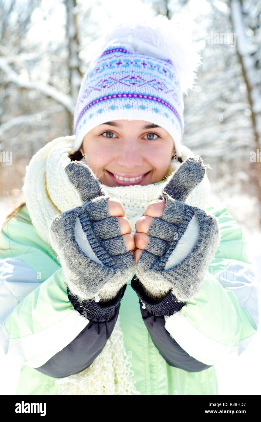 woman in winter giving a thumbs up Stock Photo - Alamy