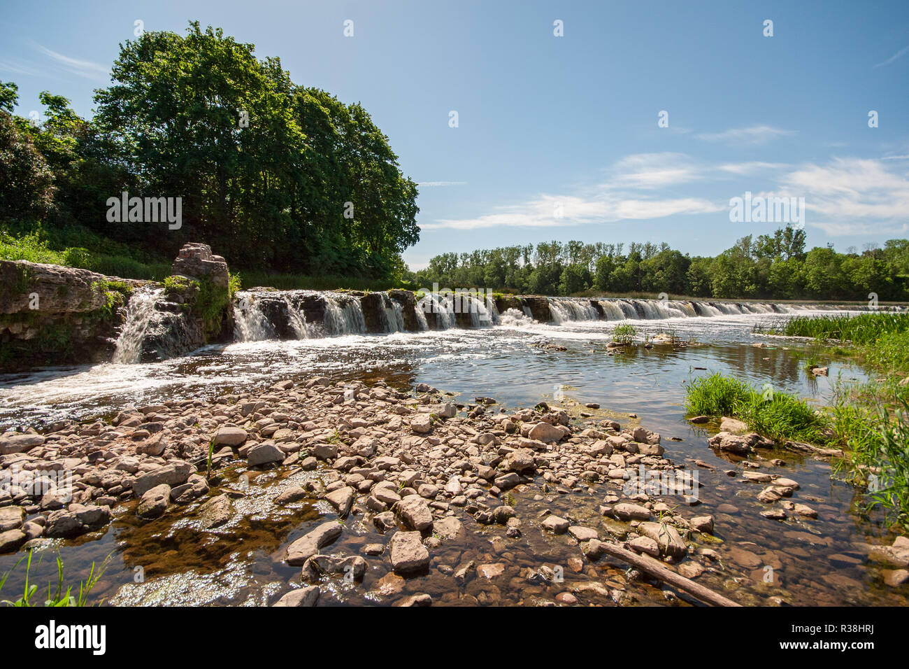 fresh clean waterfall in summer with loads of water Stock Photo - Alamy