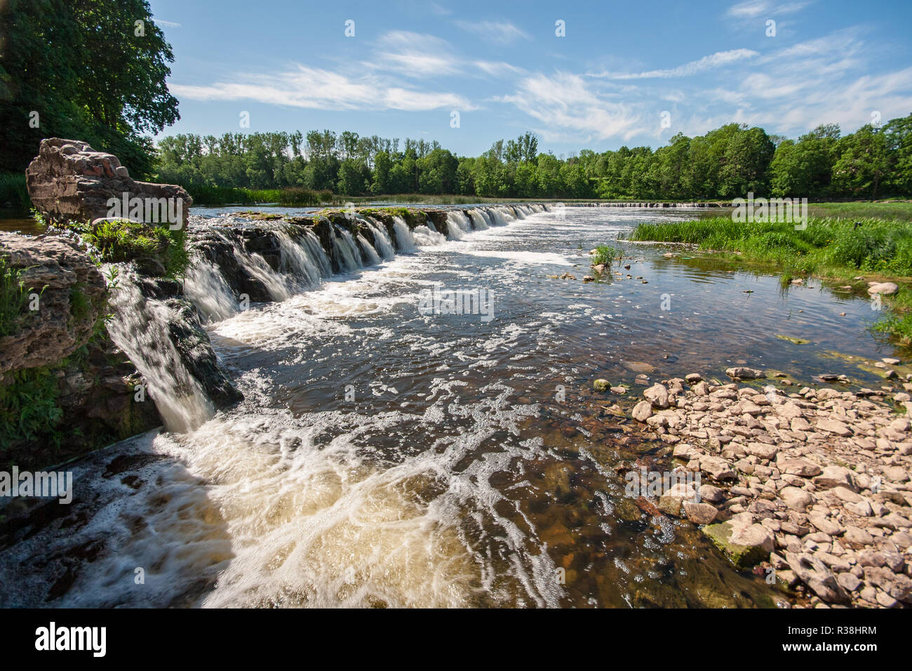 fresh clean waterfall in summer with loads of water Stock Photo - Alamy
