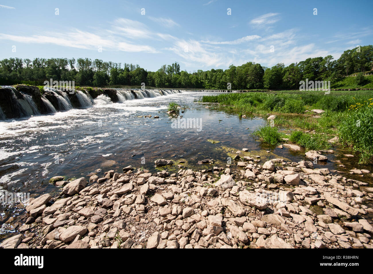 fresh clean waterfall in summer with loads of water Stock Photo - Alamy