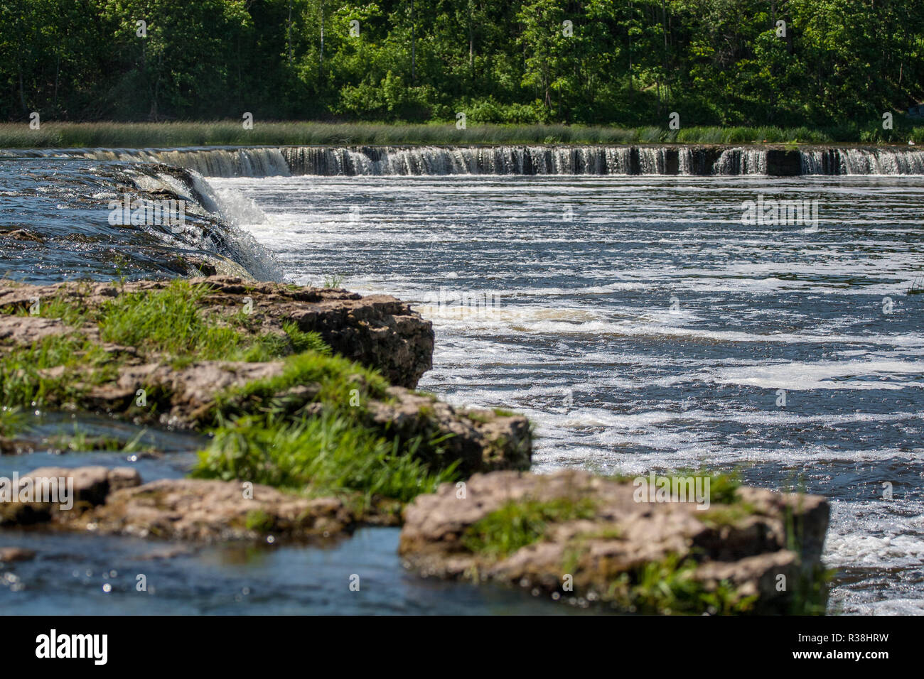 fresh clean waterfall in summer with loads of water Stock Photo - Alamy