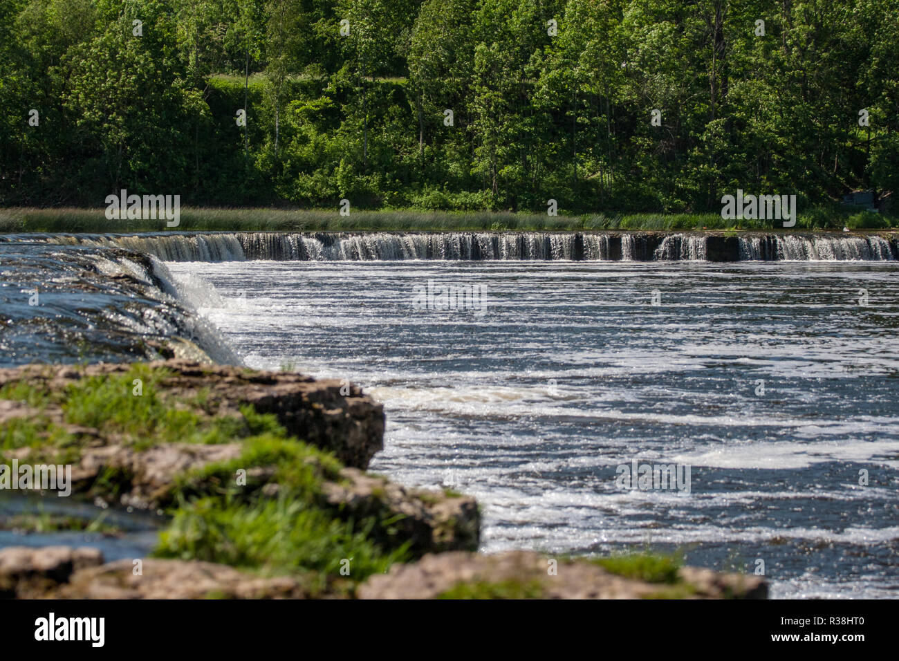 fresh clean waterfall in summer with loads of water Stock Photo - Alamy