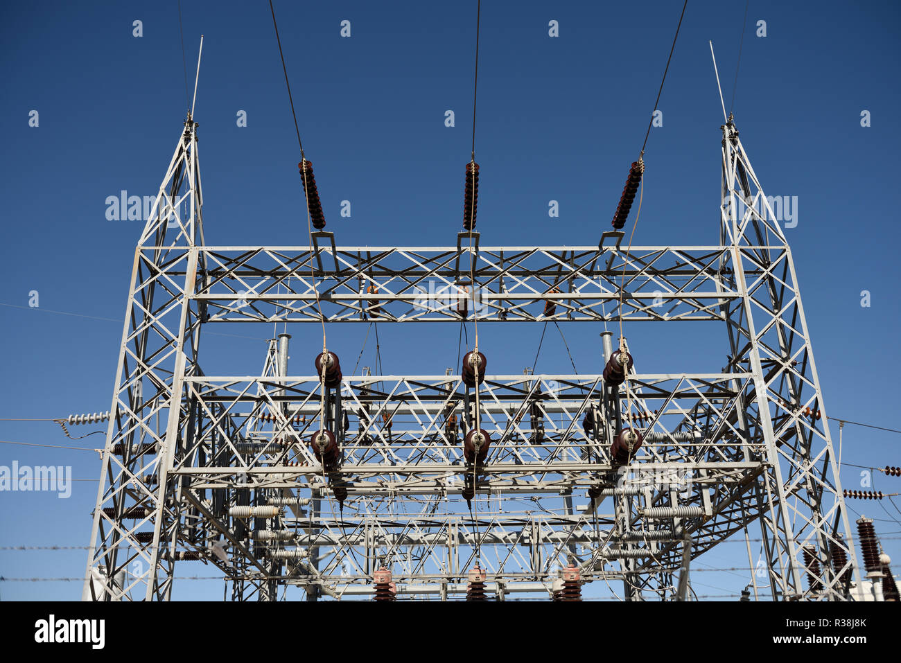 Power grid infrastructure, high voltage electrical substation metal ...