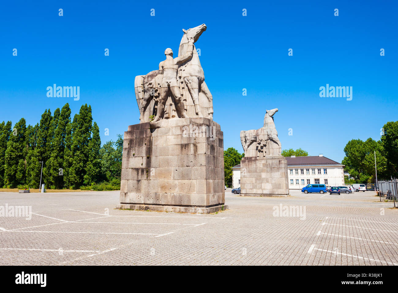 Man and horse monument statue in Nordpark, public green area in the ...