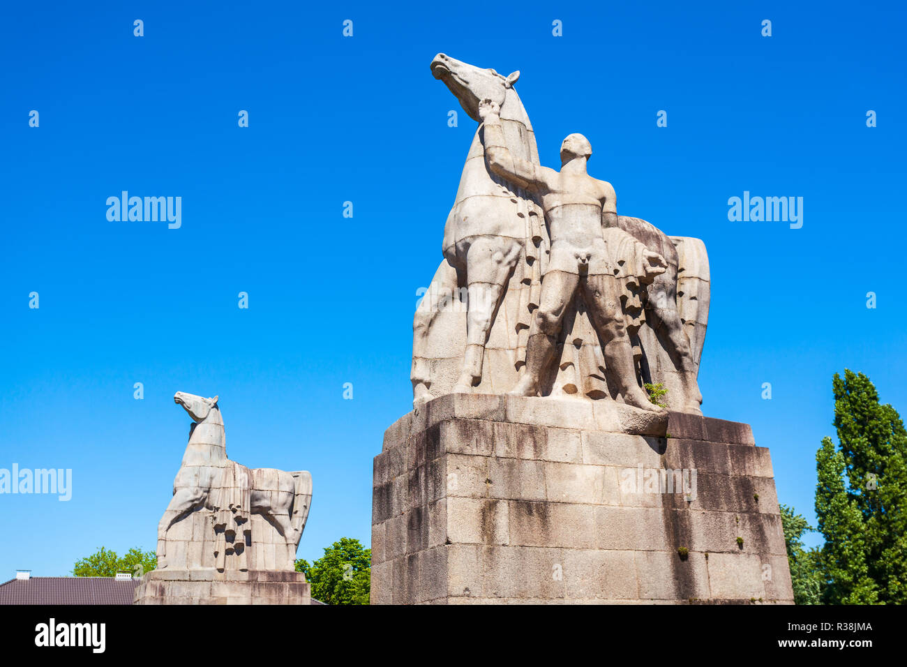 Man and horse monument statue in Nordpark, public green area in the ...