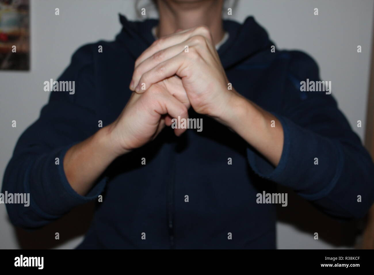 Cracking Knuckles, Female Stock Photo - Alamy