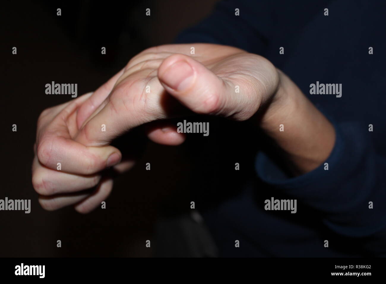 Cracking Knuckles, Female Stock Photo - Alamy
