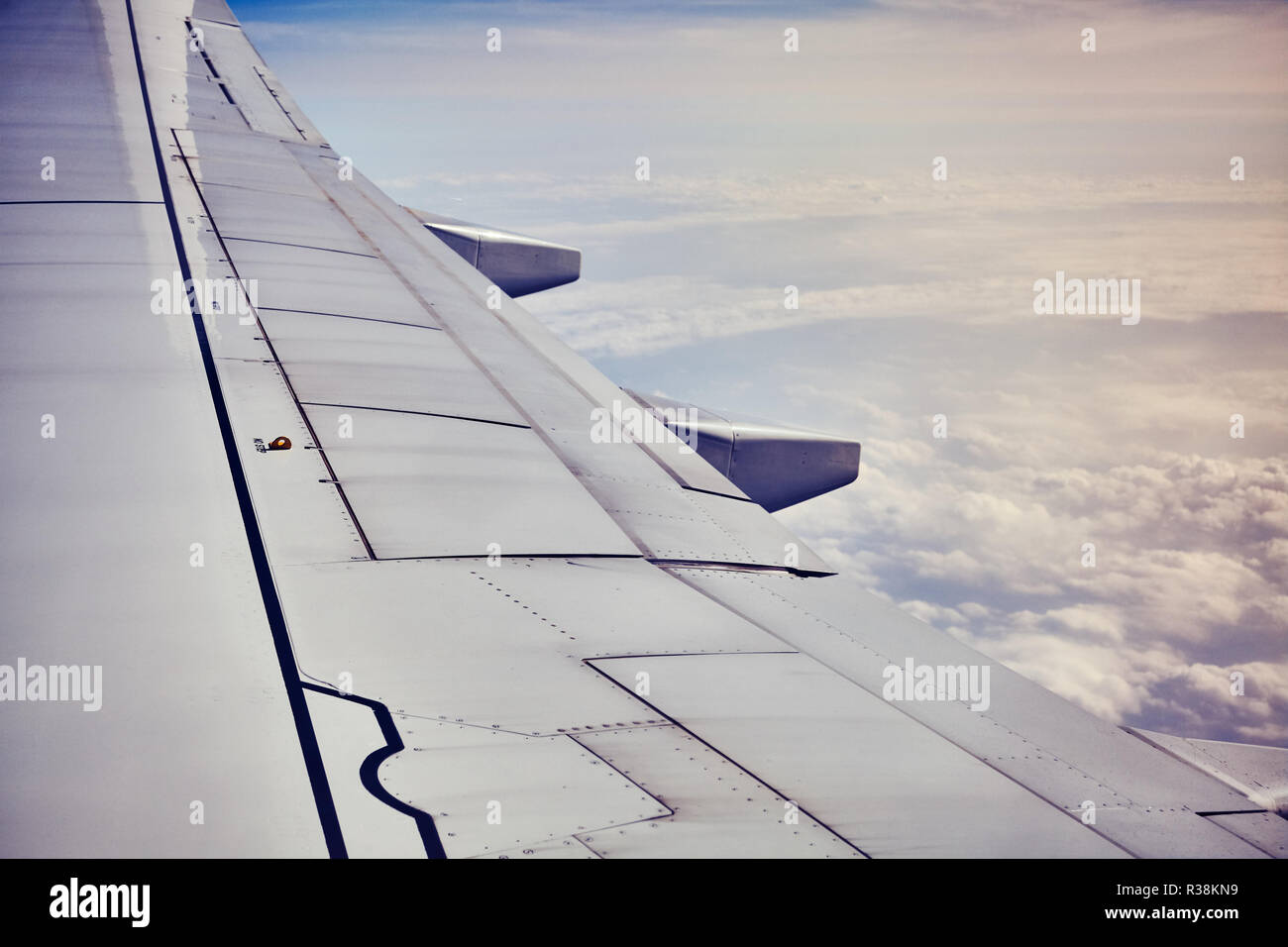 Color toned picture of an airplane wing, selective focus Stock Photo ...