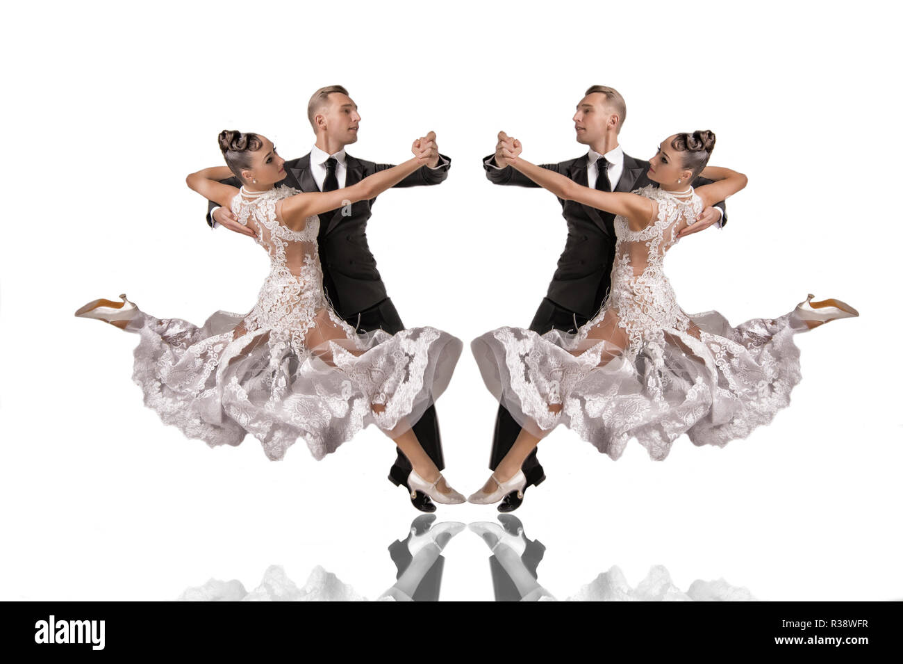 beautiful ballroom dance couple in a dance pose isolated on white ...