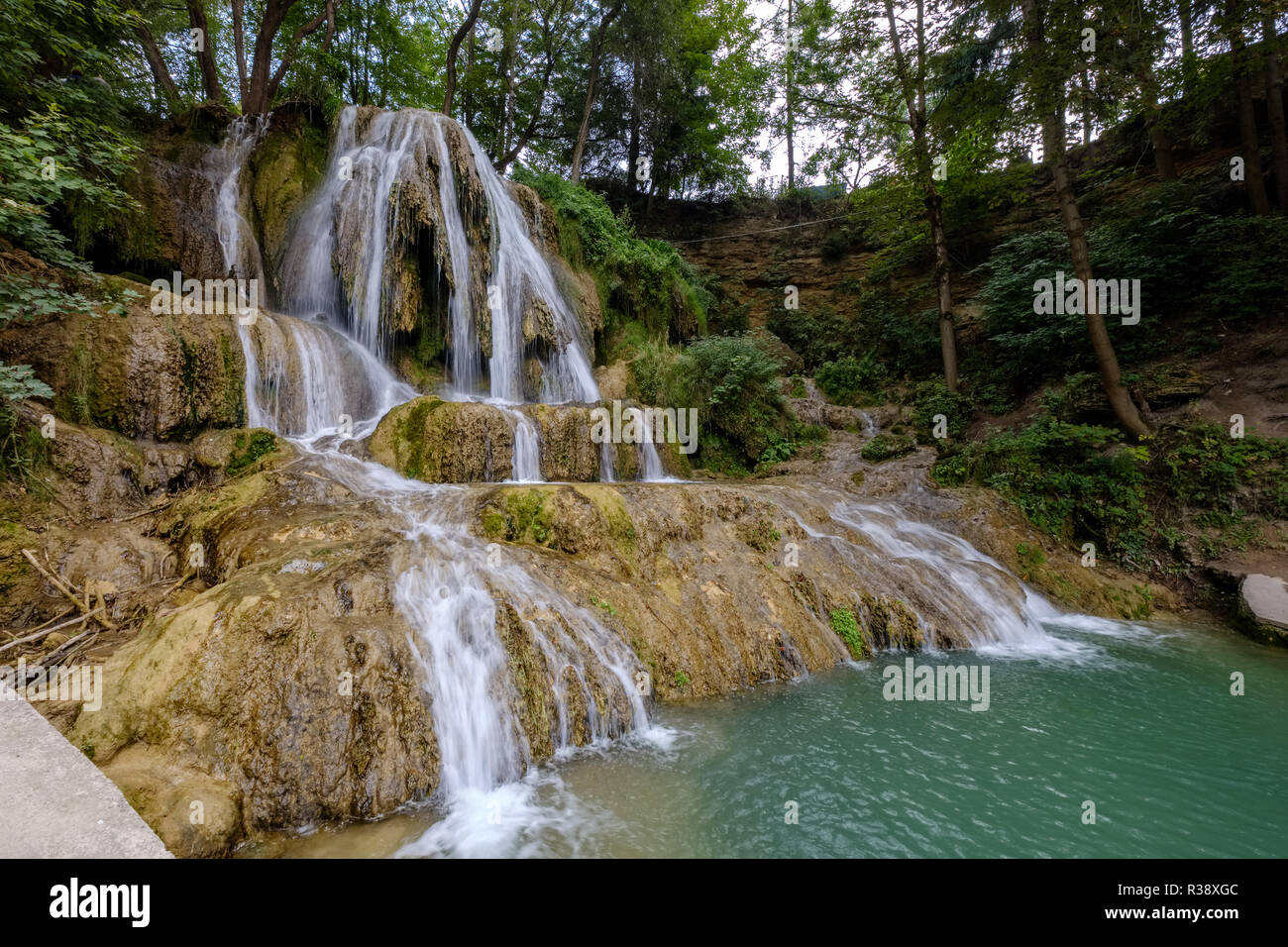 fresh clean waterfall in summer with loads of water Stock Photo - Alamy