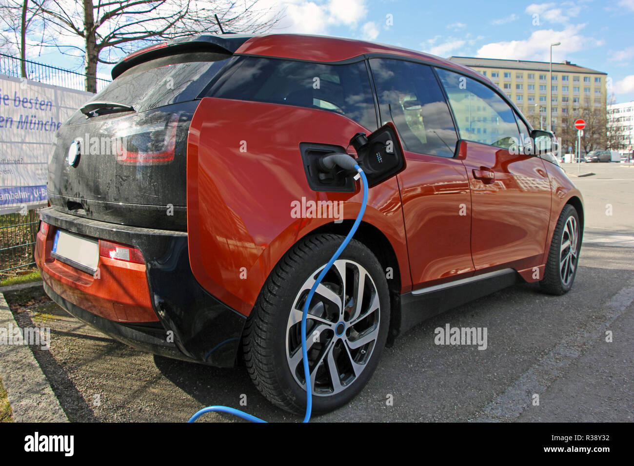 electric car at the loading station Stock Photo - Alamy