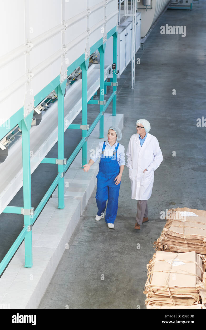 Workers at Factory Background Stock Photo - Alamy
