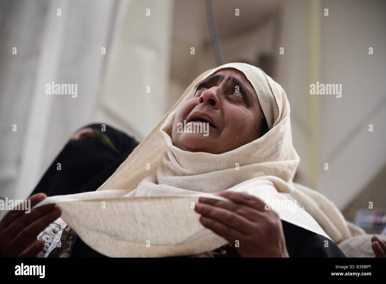 Kashmiri Muslim woman seen crying while beseeching for blessings as the ...