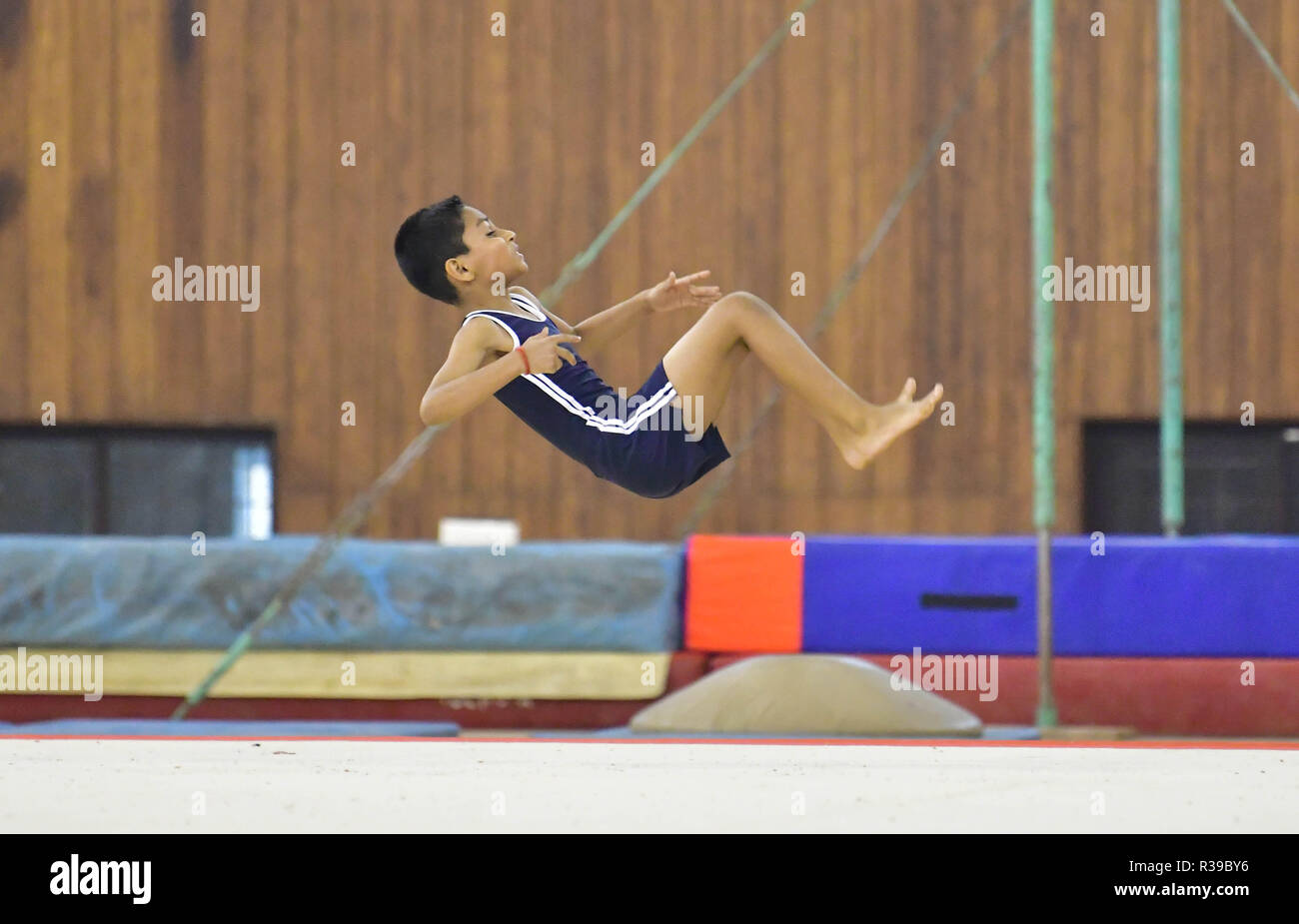 A Gymnast from Northeast India performz at the indoor stadium during ...