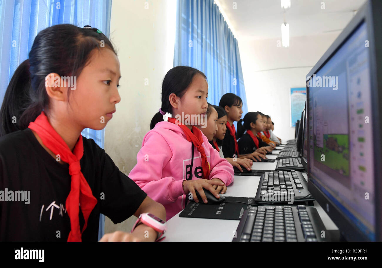 Kunming, China's Yunnan Province. 20th Nov, 2018. Children attend ...