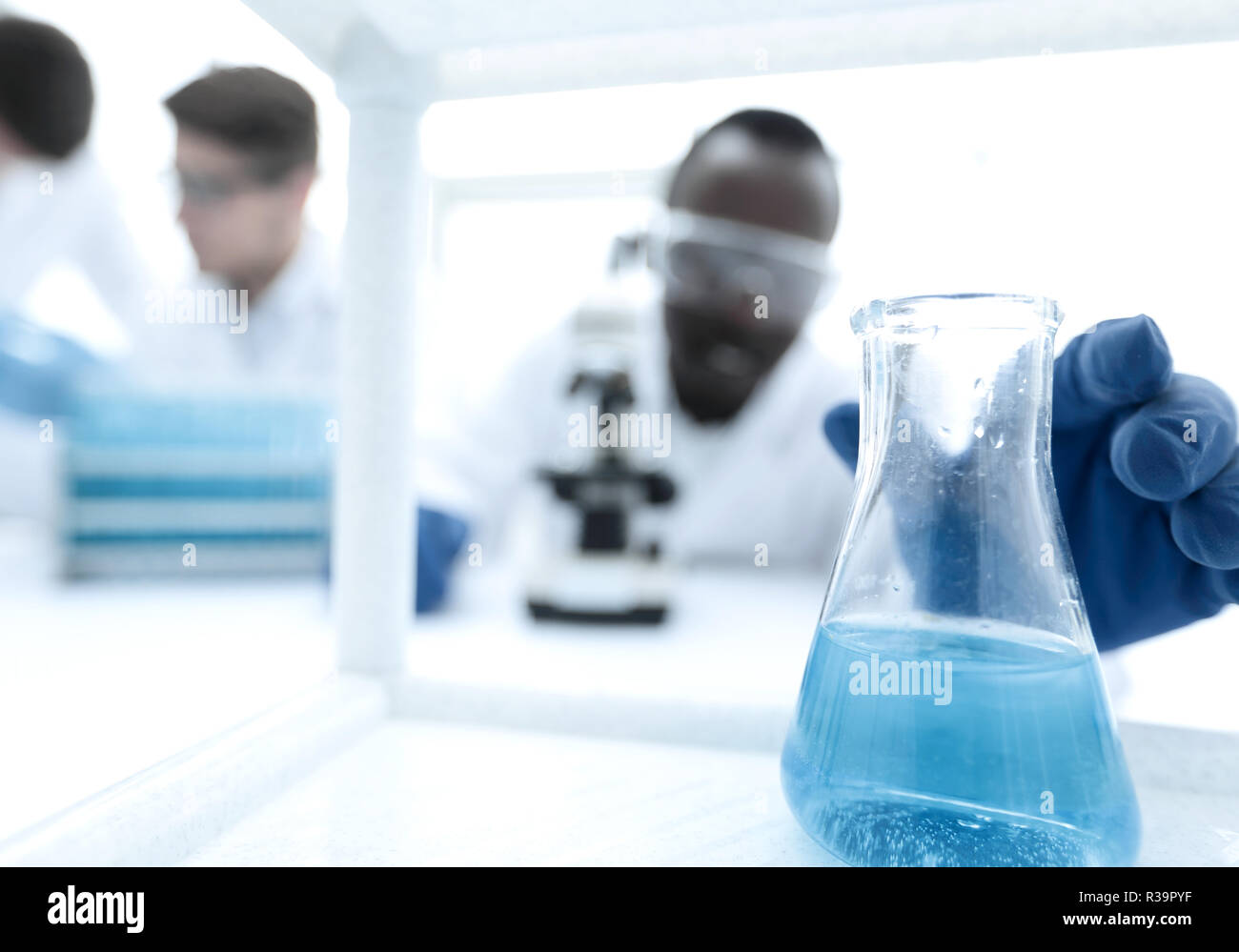 background image of scientists in the chemical laboratory Stock Photo ...
