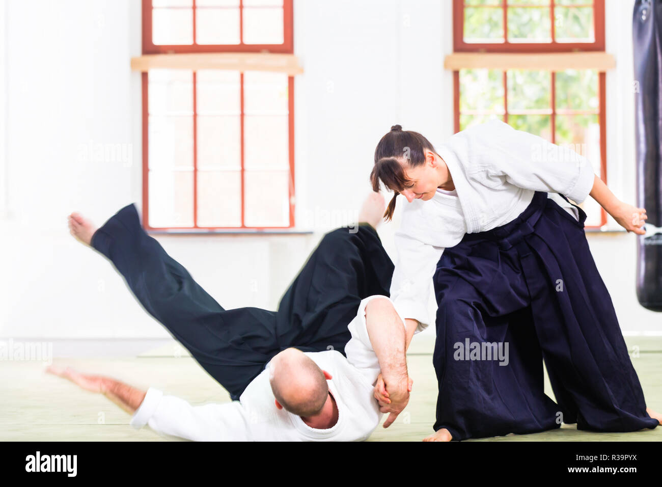 aikido teachers and students train and throw Stock Photo - Alamy