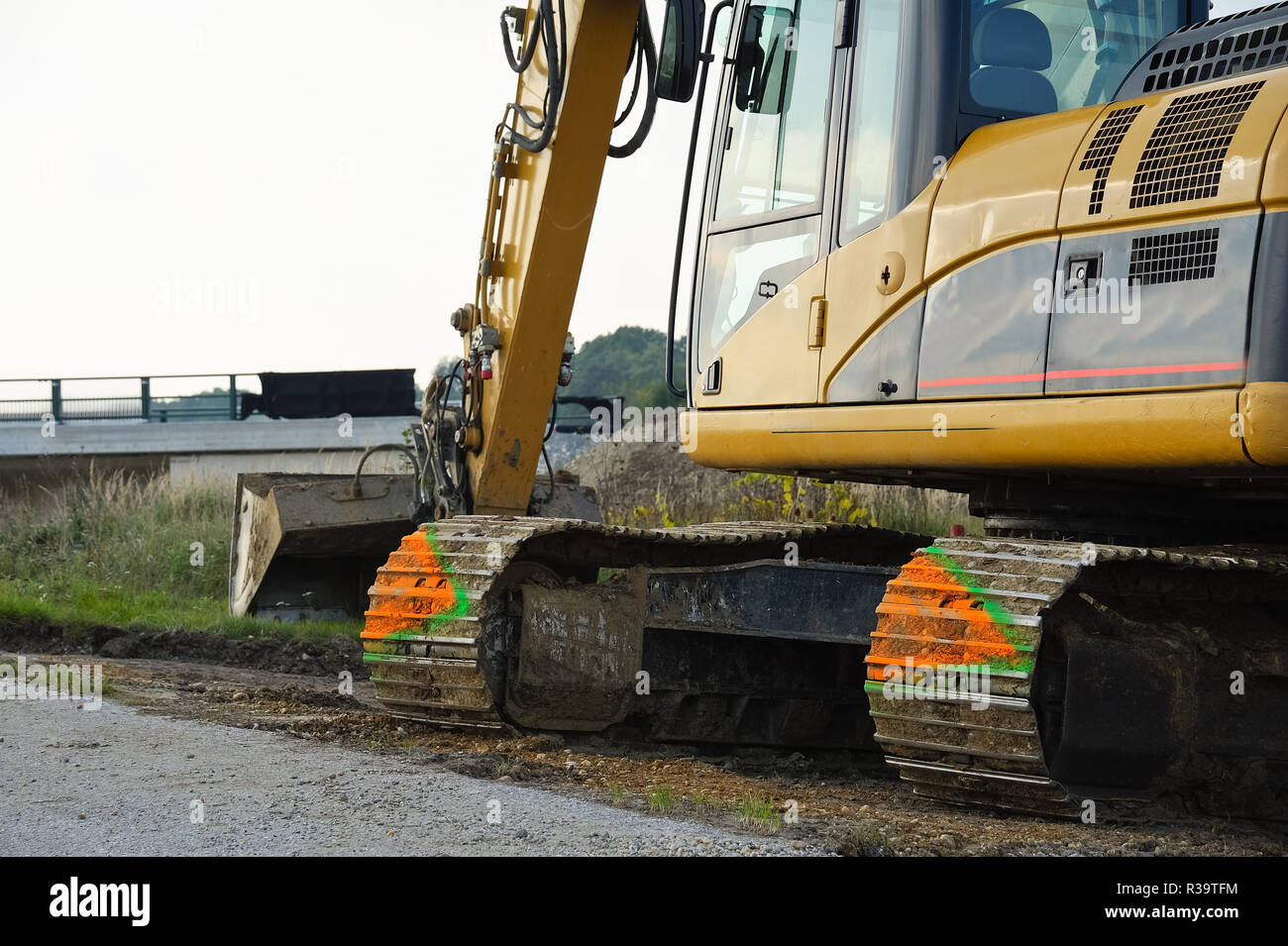 excavator as a guide Stock Photo - Alamy
