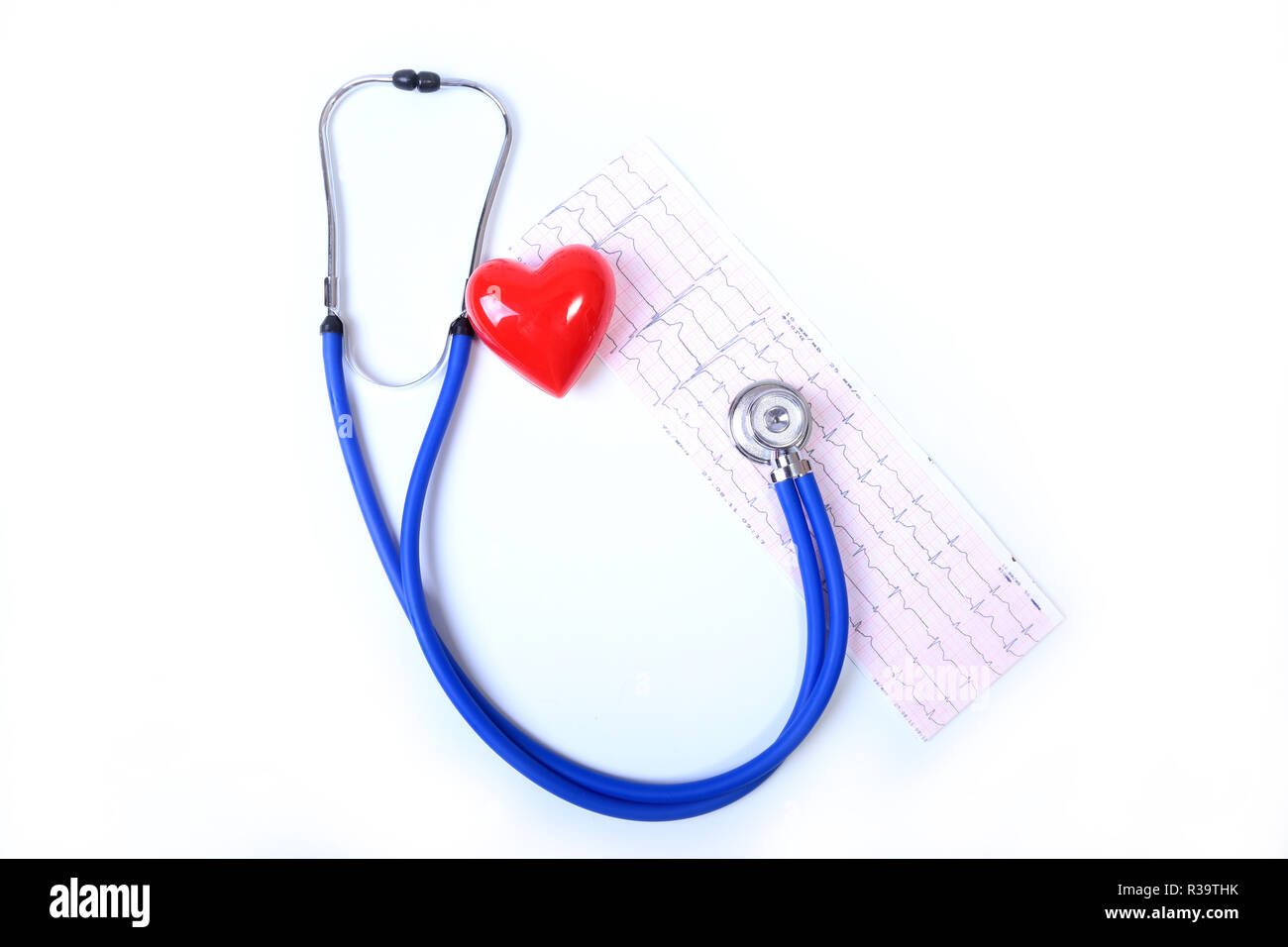 Heart with a medical stethoscope, isolated on wooden background Stock ...