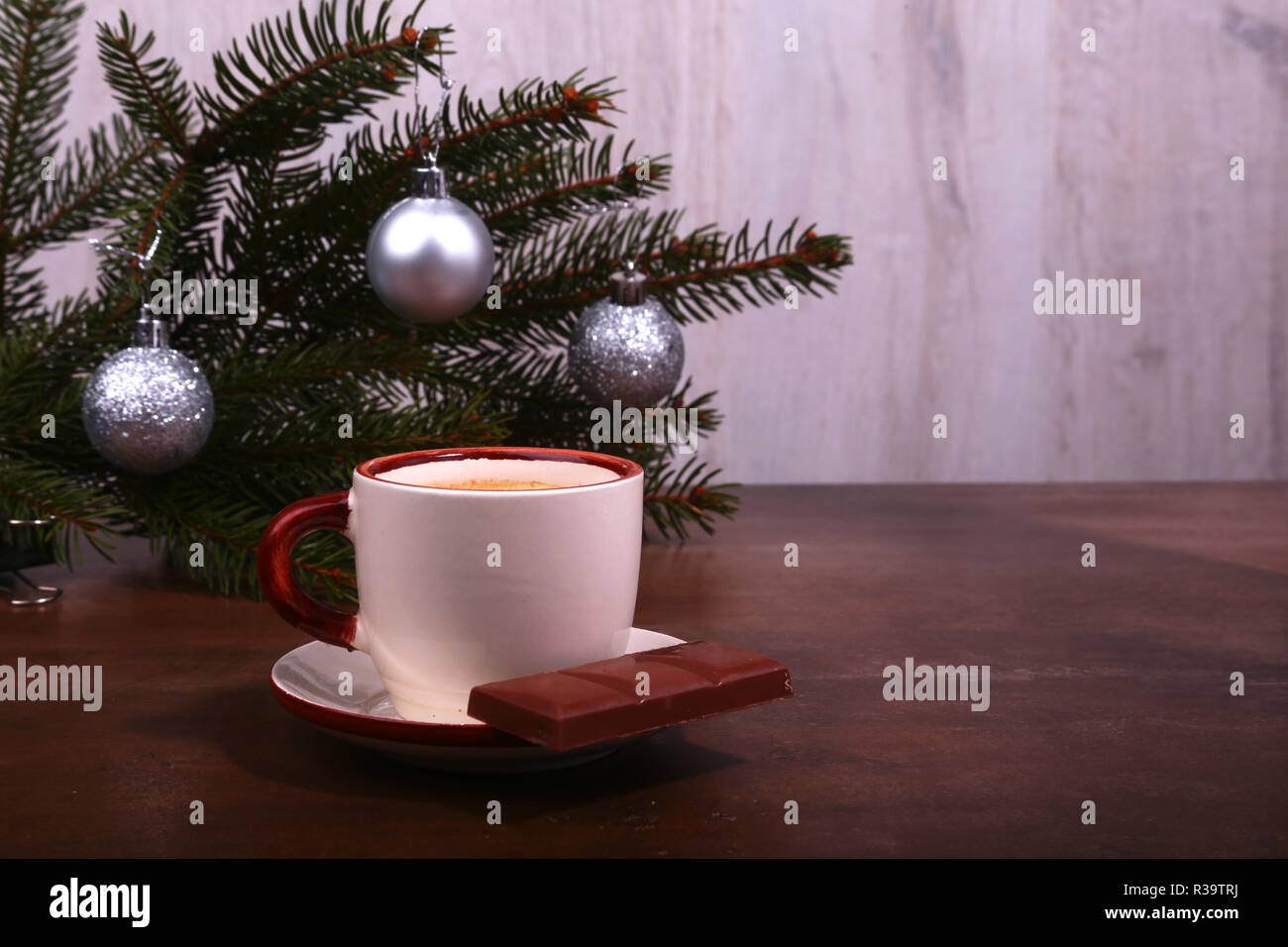 Coffee cup and chocolate on wooden table texture. Coffeebreak ...