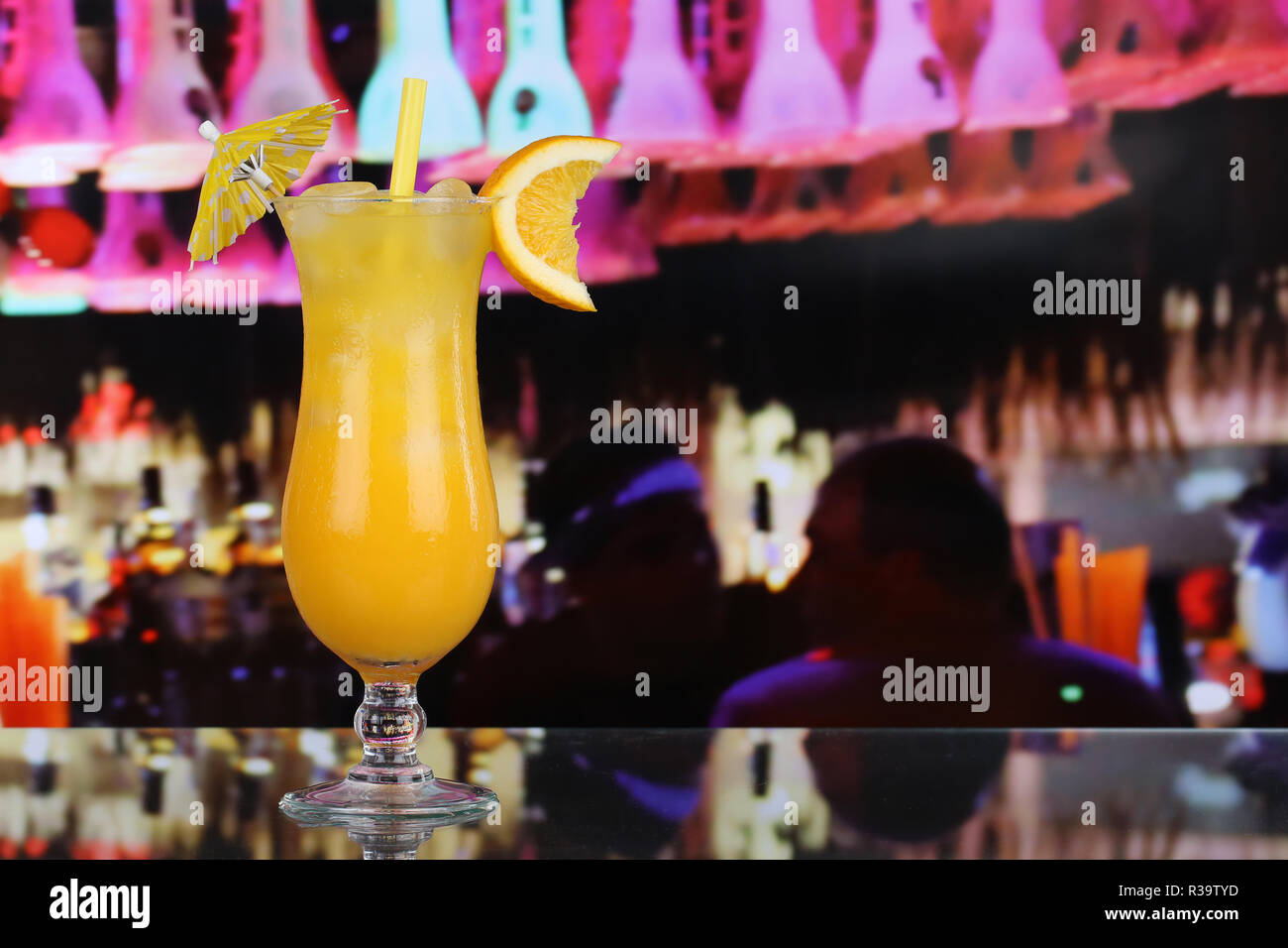 oranges fruit cocktail juice in a bar with copy space Stock Photo - Alamy