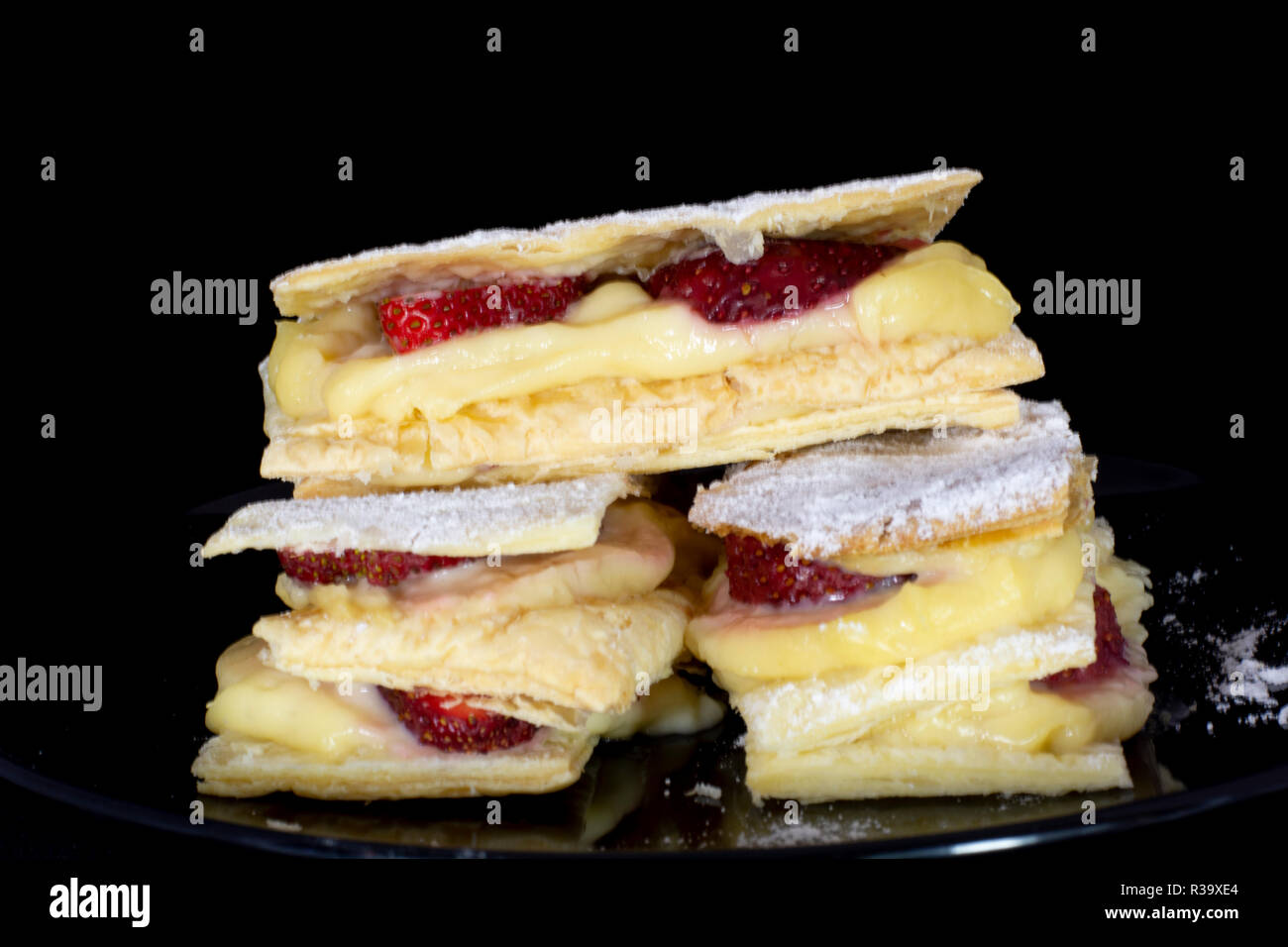 French Mille-feuille cake with fresh strawberry with isolated black ...