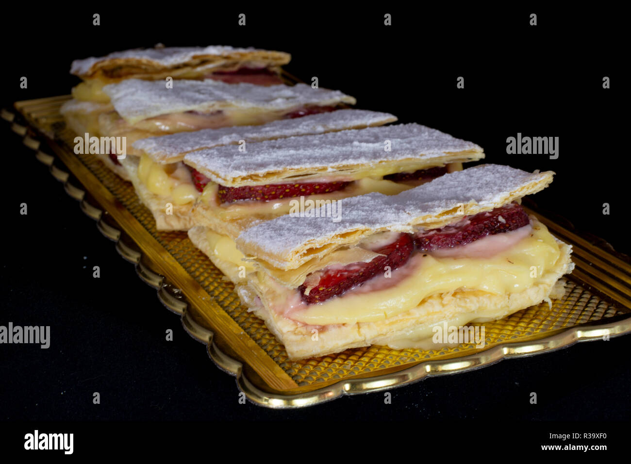 French Mille-feuille cake with fresh strawberry with isolated black ...