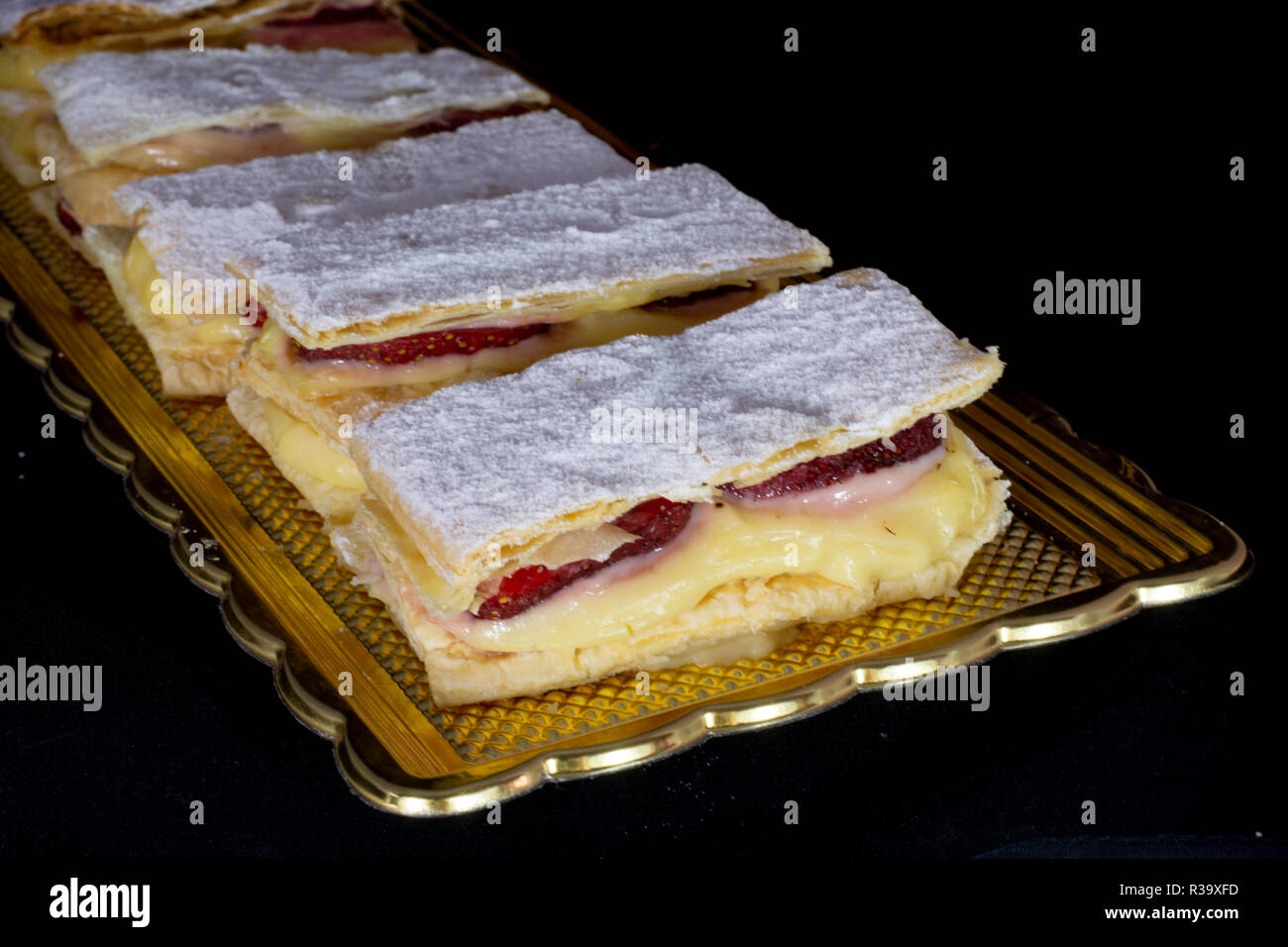 French Mille-feuille cake with fresh strawberry with isolated black ...