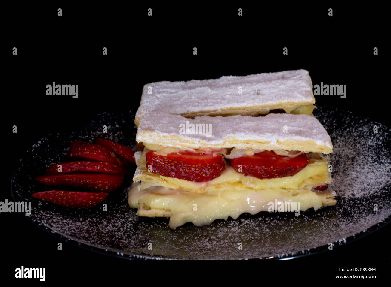 French Mille-feuille cake with fresh strawberry with isolated black ...