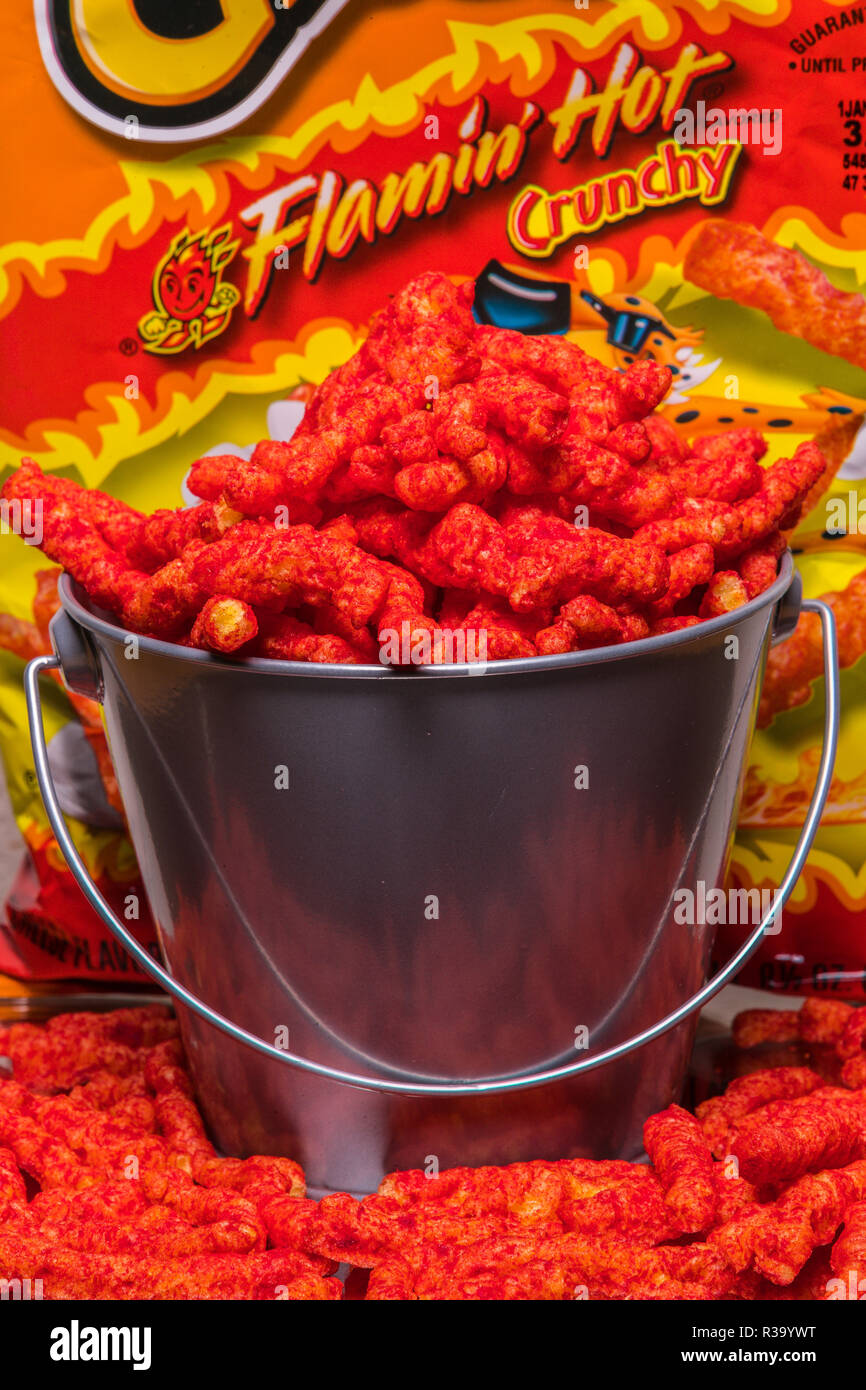 flamin' hot cheetos in bucket with bag Stock Photo - Alamy