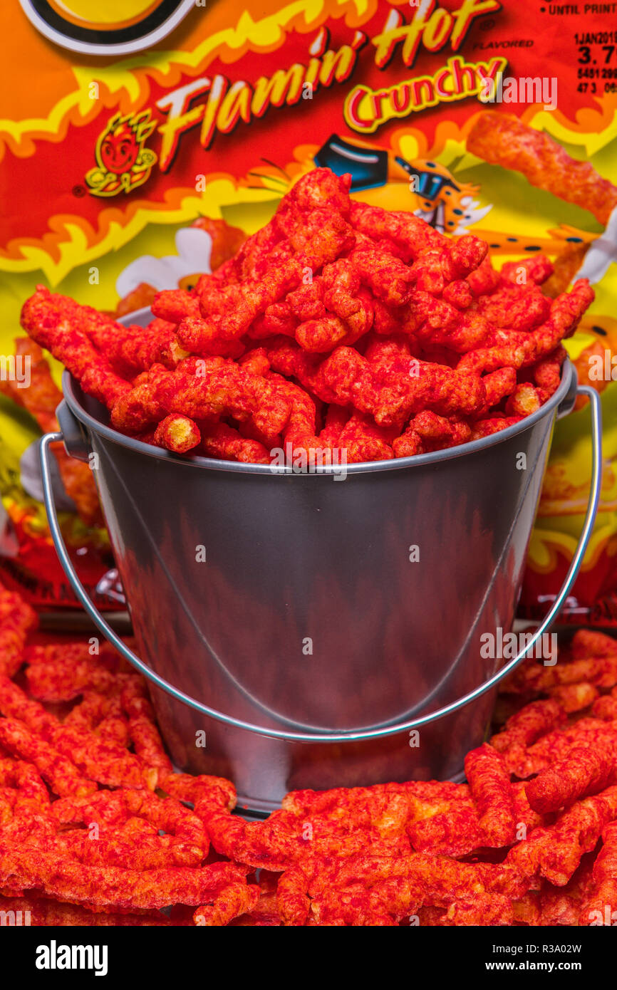 flamin' hot cheetos in bucket with bag Stock Photo - Alamy