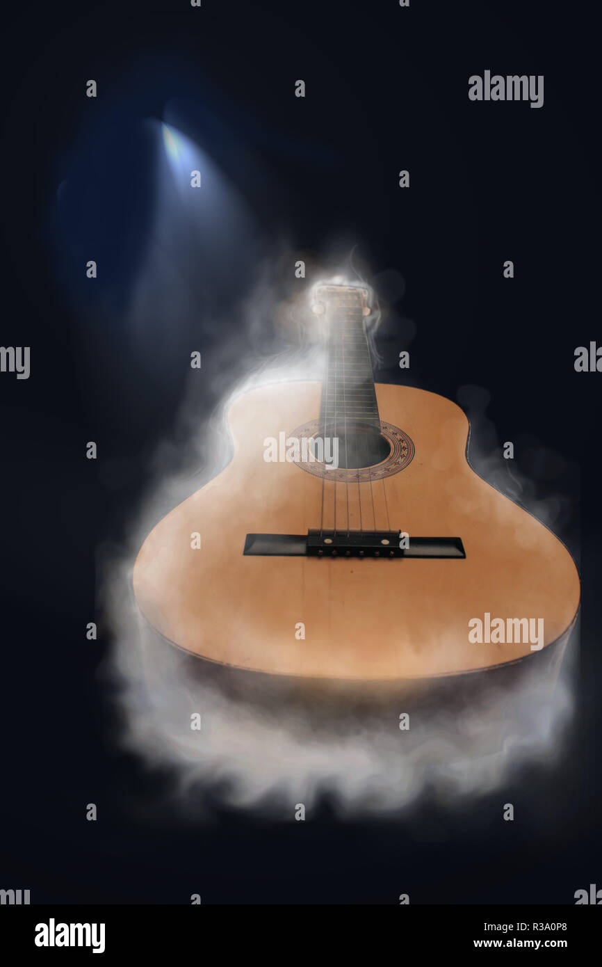 guitar in the cloud. guitar in smoke and ray of light Stock Photo - Alamy