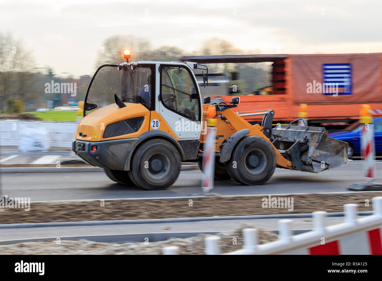 road excavator in motion Stock Photo - Alamy