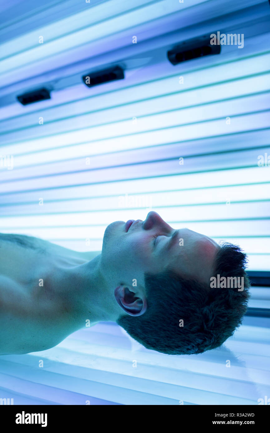 Man, tanning salon hi-res stock photography and images - Alamy