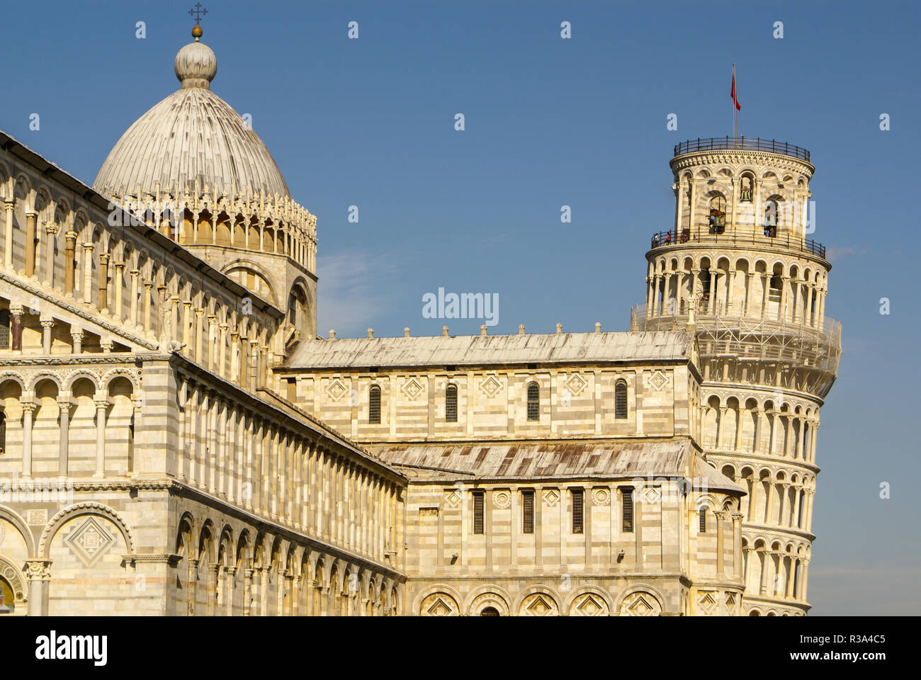the famous leaning tower in pisa on cloudy sky background Stock Photo ...