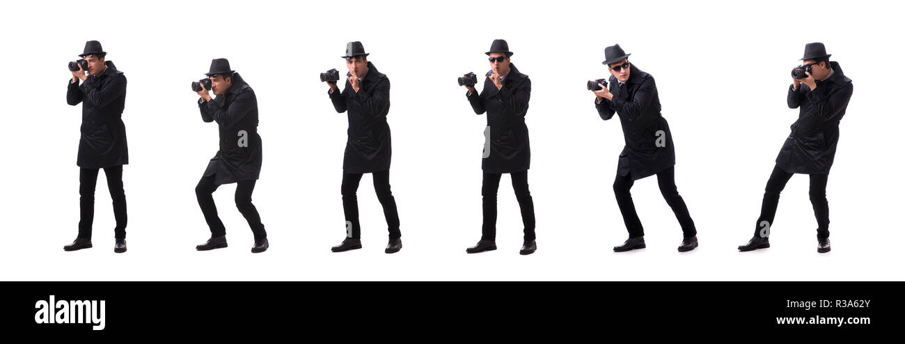 Spy with camera taking pictures isolated on white Stock Photo - Alamy