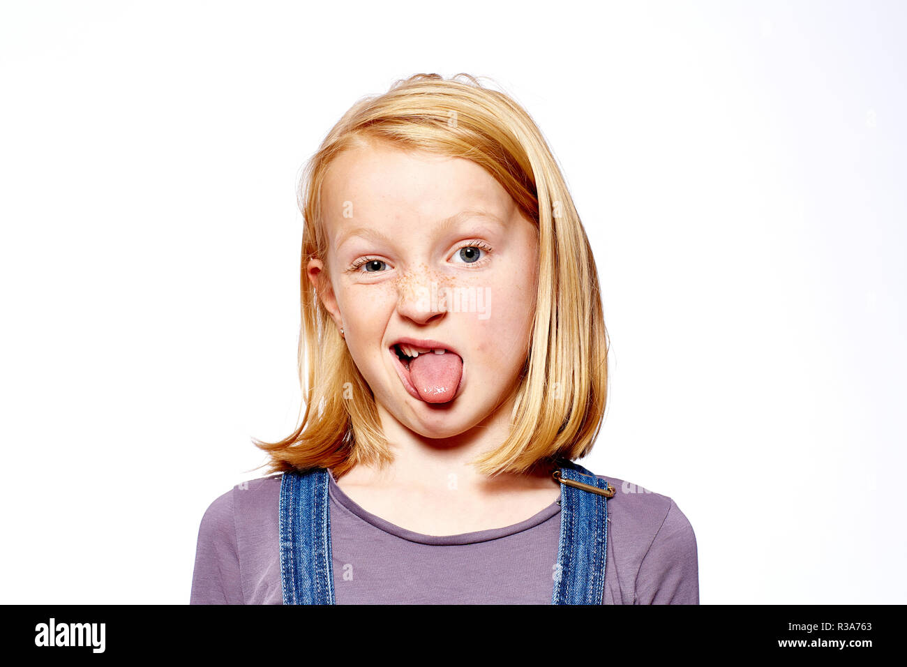 girl looks cheeky Stock Photo - Alamy