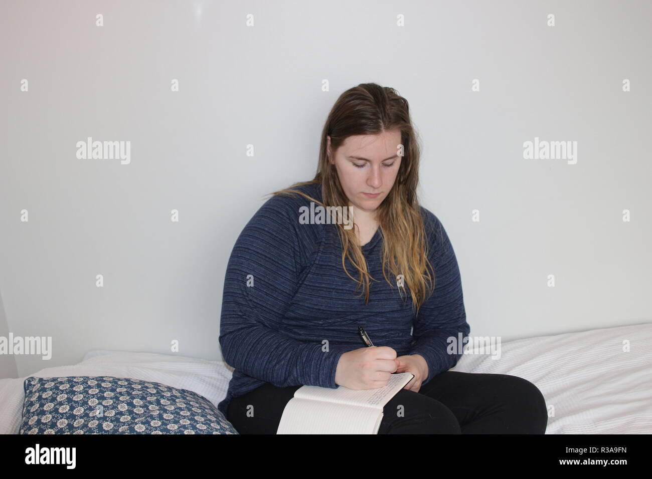 Woman writing in dream journal hi-res stock photography and images - Alamy