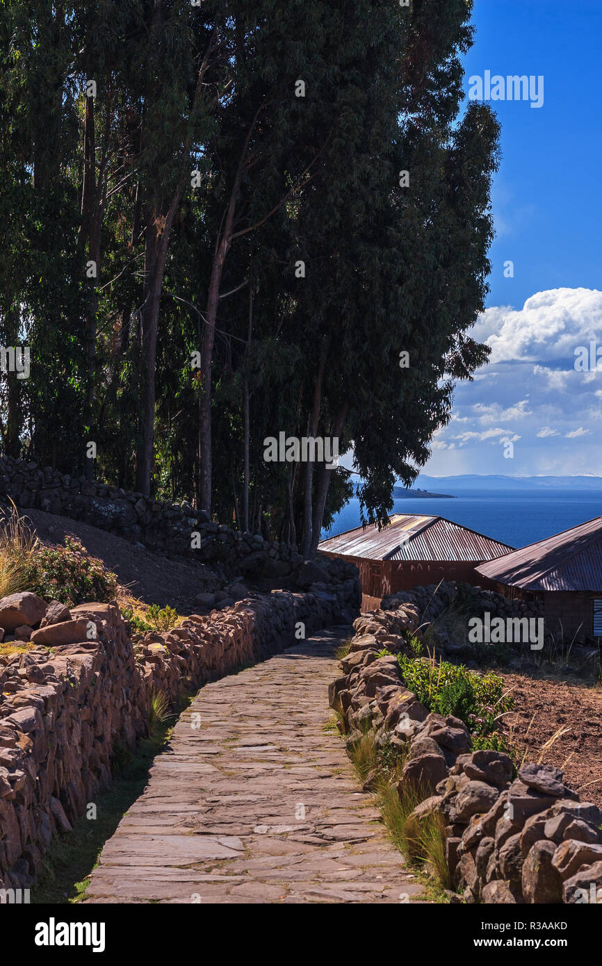View of a rock path around Taquile island at Titicaca lake Stock Photo ...