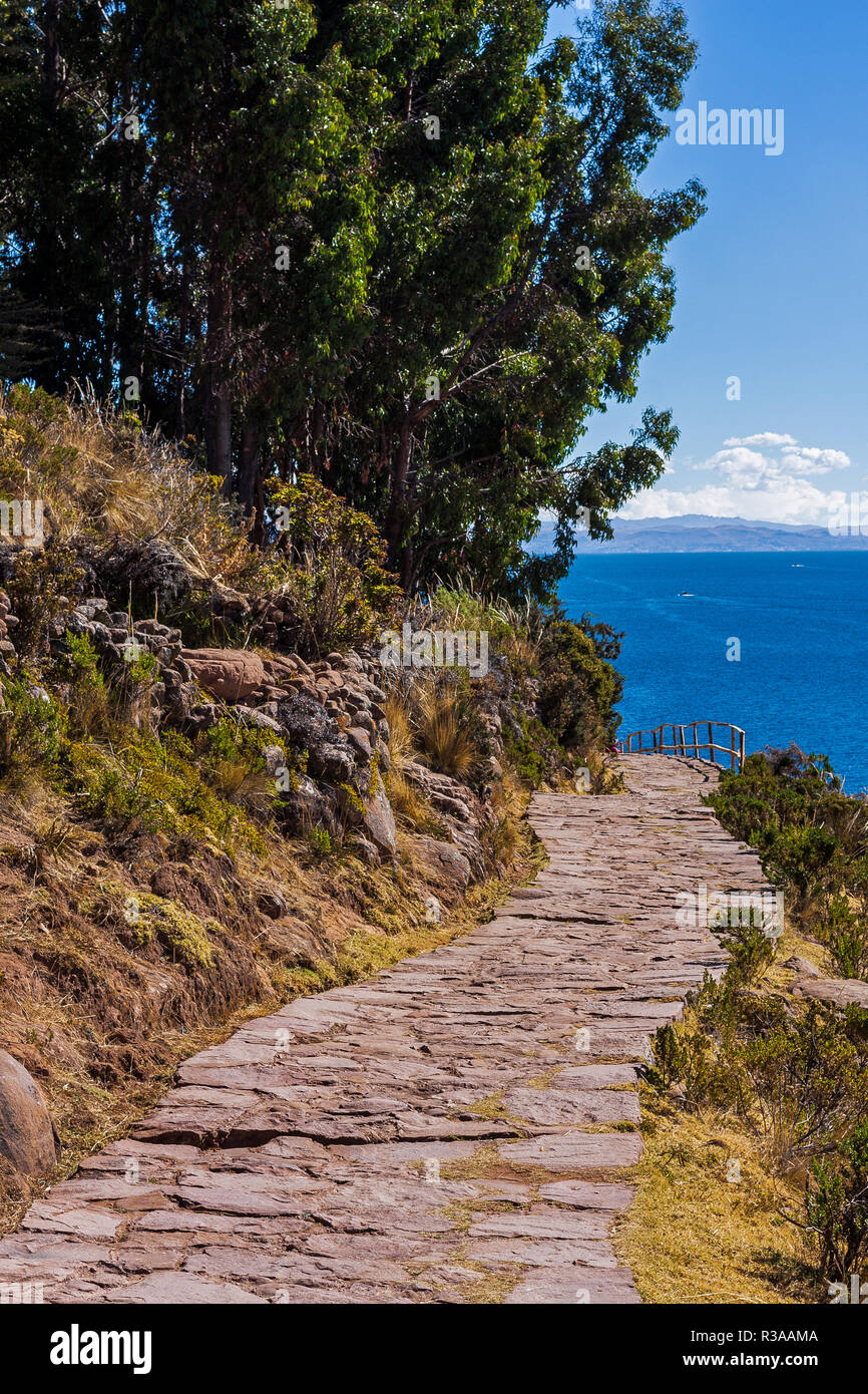 View of a rock path around Taquile island at Titicaca lake Stock Photo ...