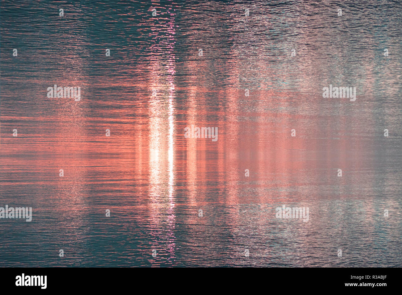 water surface with sunset reflection textured background copyspace ...