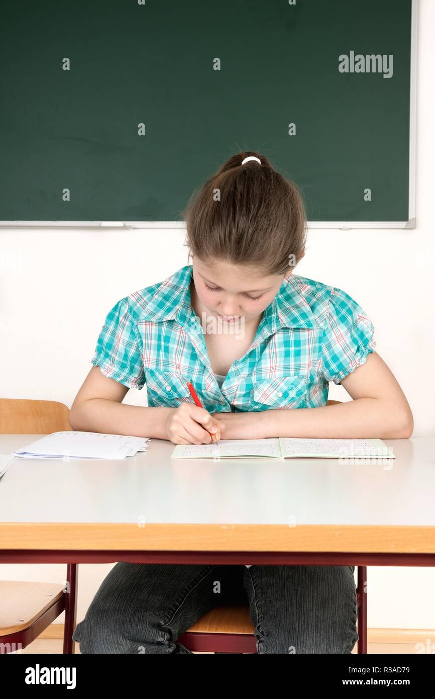Sitting schoolgirl smiling education face to face hi-res stock ...