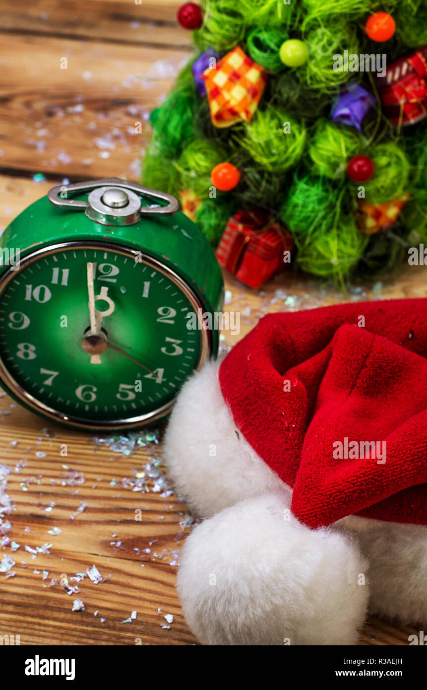 postcard with green old-fashioned clock and christmas decorations Stock ...