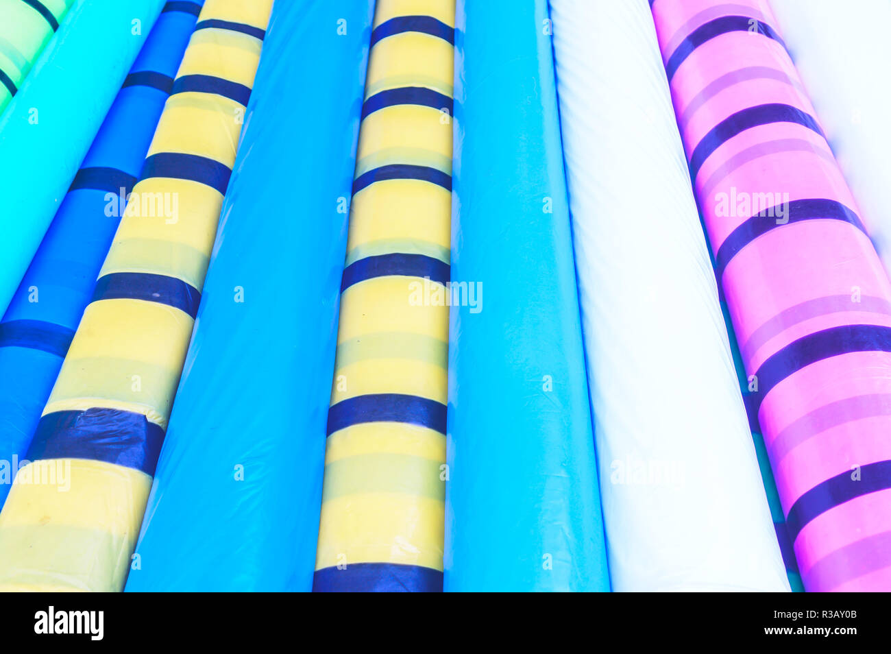 Smooth round shape roller of protective PVC sheet. Seamless colorful ...