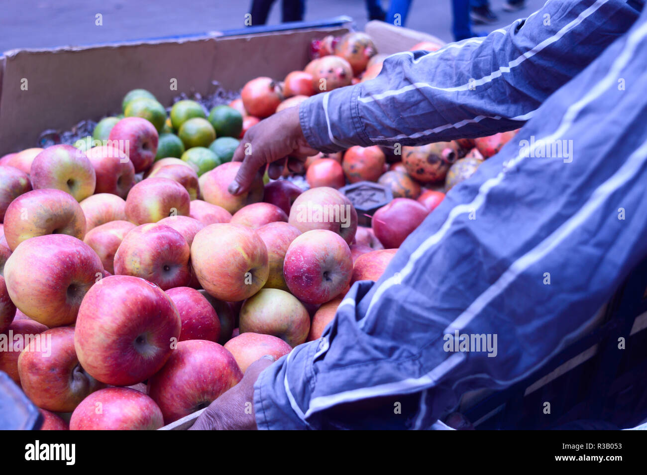 Freshly Juicy Picked Heap Of Red Apples Displayed For Customer In A freshly-juicy-picked-heap-of-red-apples-displayed-for-customer-in-a