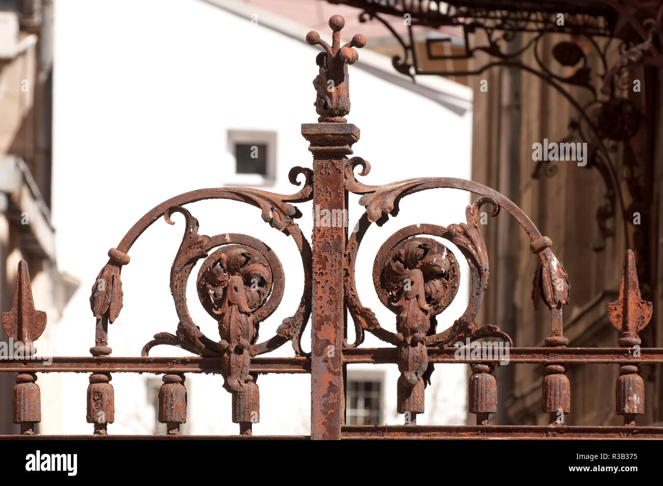 Detail of a rusty iron gate, close up picture Stock Photo - Alamy