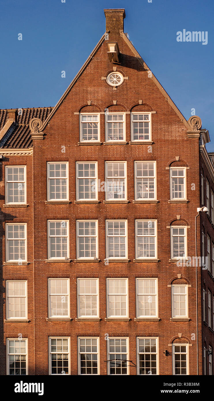 Old traditional dutch building in Amsterdam, Netherlands Stock Photo ...